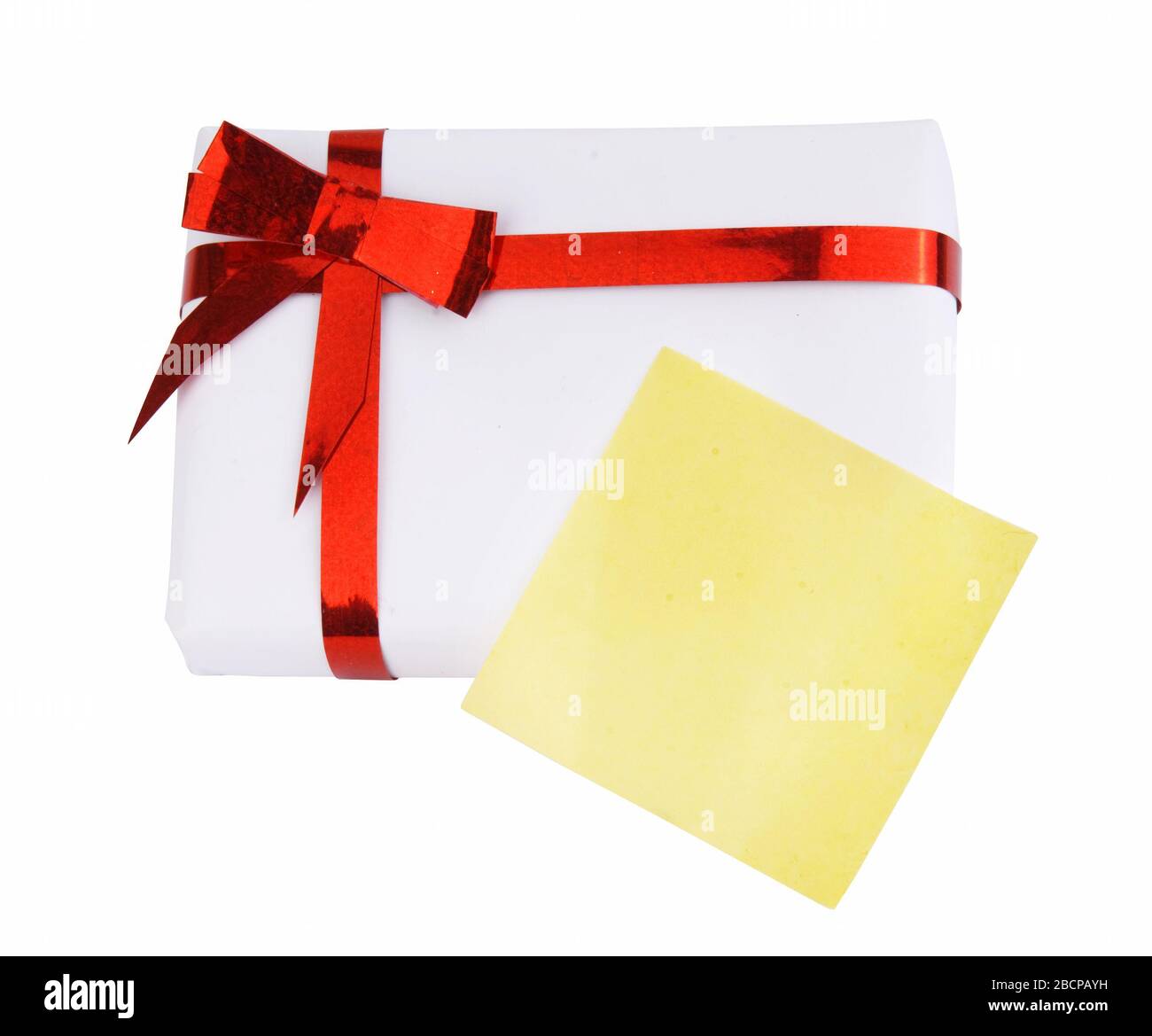 Gift on a white background with a note Stock Photo - Alamy