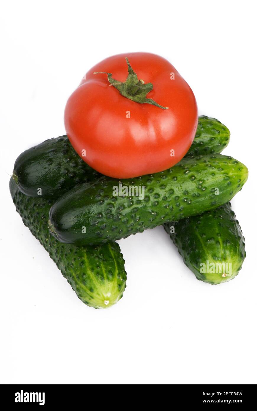 Cucumbers growing Cut Out Stock Images & Pictures - Alamy
