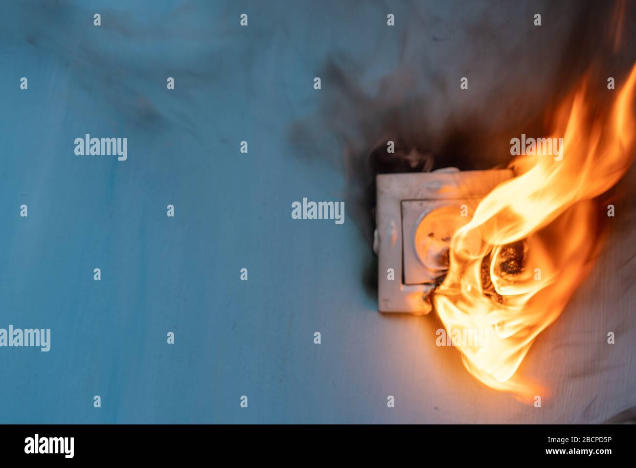 Apartment fire is caused by electrical outlet faults. Burnt and damaged ...