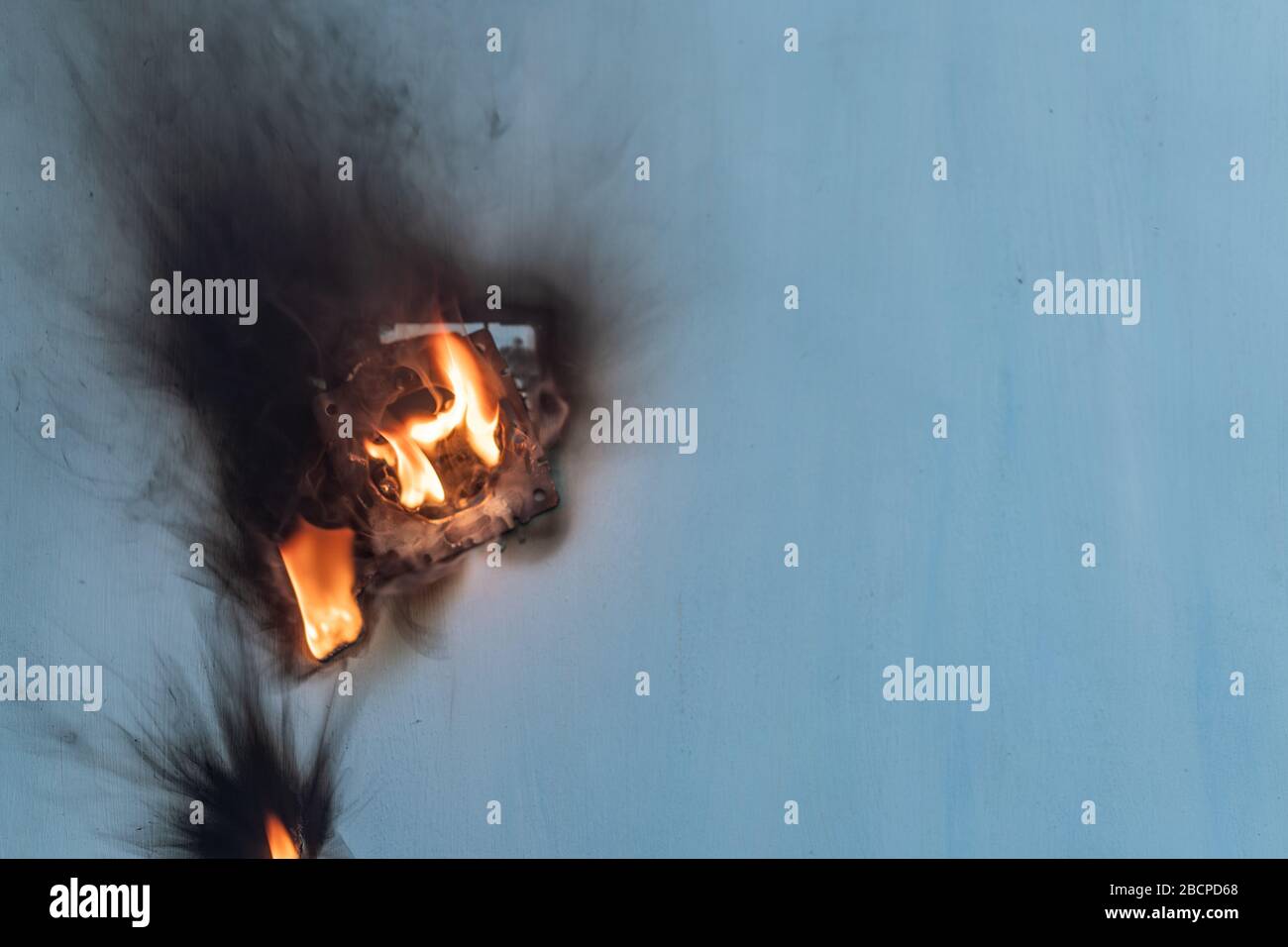 Apartment fire is caused by electrical outlet faults. Burnt and damaged ...