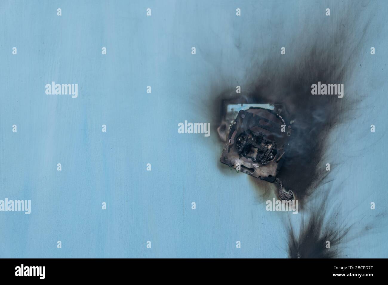 Apartment fire is caused by electrical outlet faults. Burnt and damaged ...