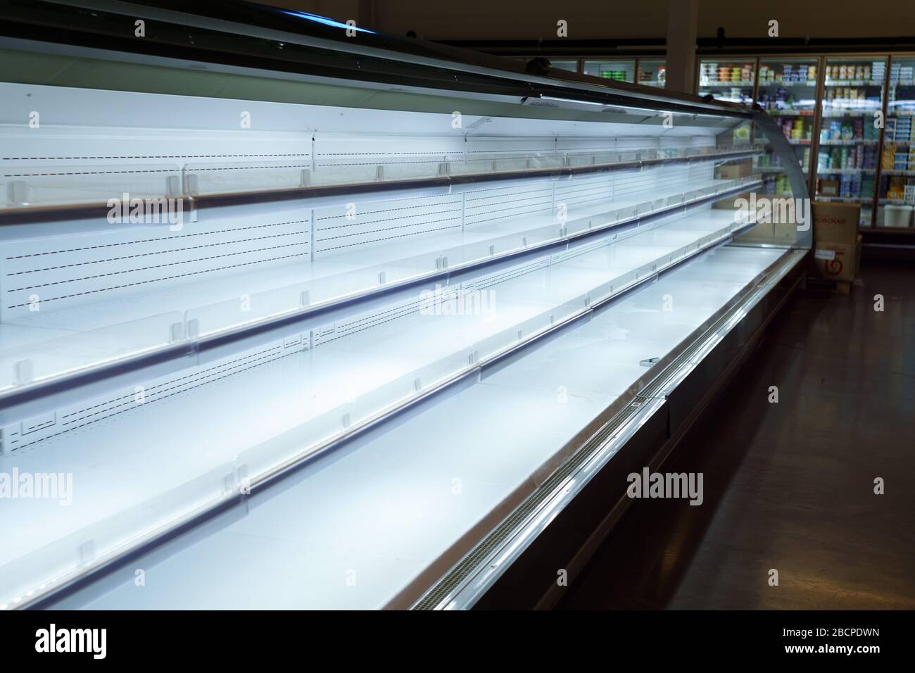 Supermarket with empty shelves for goods. Concept: sale and demand for ...