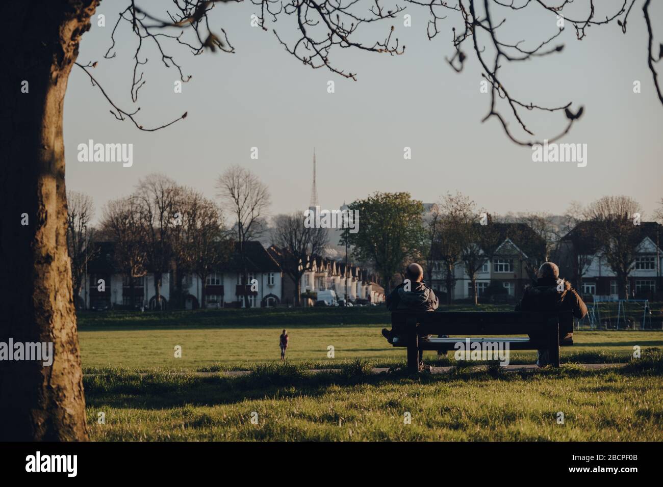 Sitting on bench opposite hi-res stock photography and images - Alamy