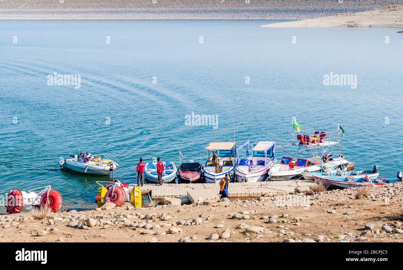 Tourists are enjoying at in the Mangla Dam lake, Mirpur, Azad Kashmir ...