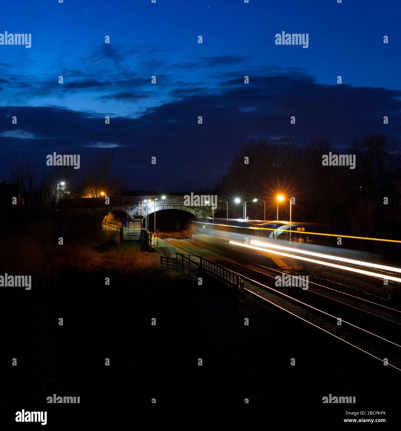 Light trails from a Northern rail train departing from Long Preston ...