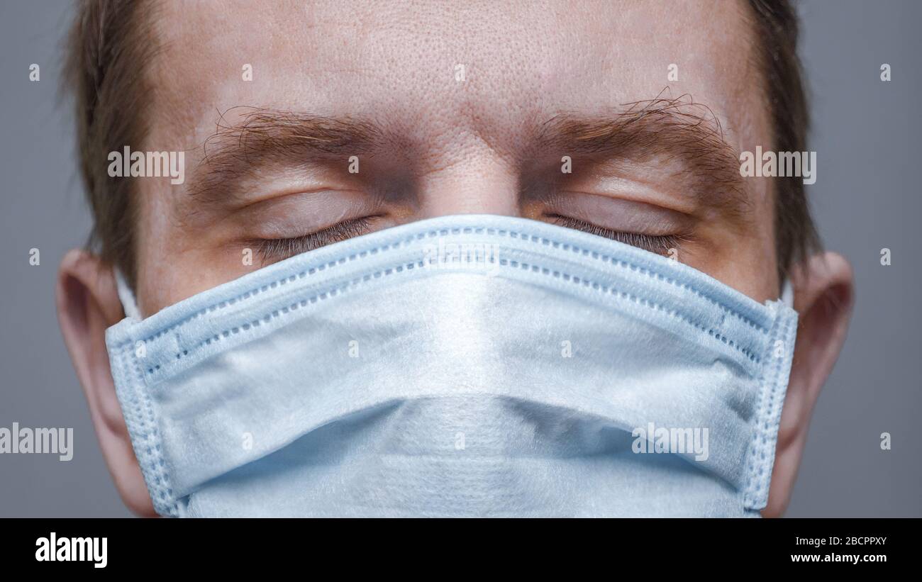 Coronavirus disease, male face. COVID-19. Critical time: pandemic ...