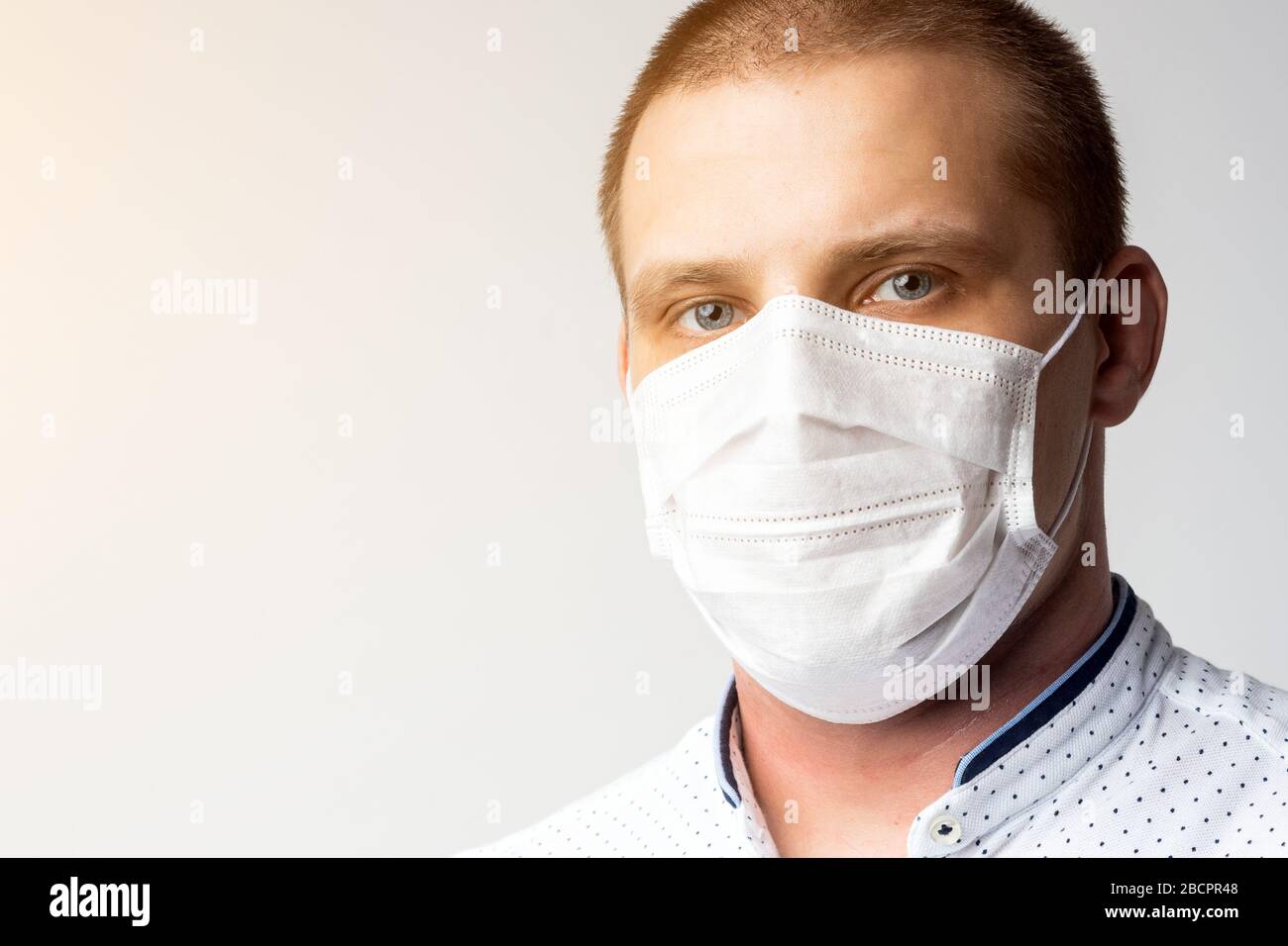 Young man wear masks to prevent air pollution, haze and PM 2.5 dust and ...