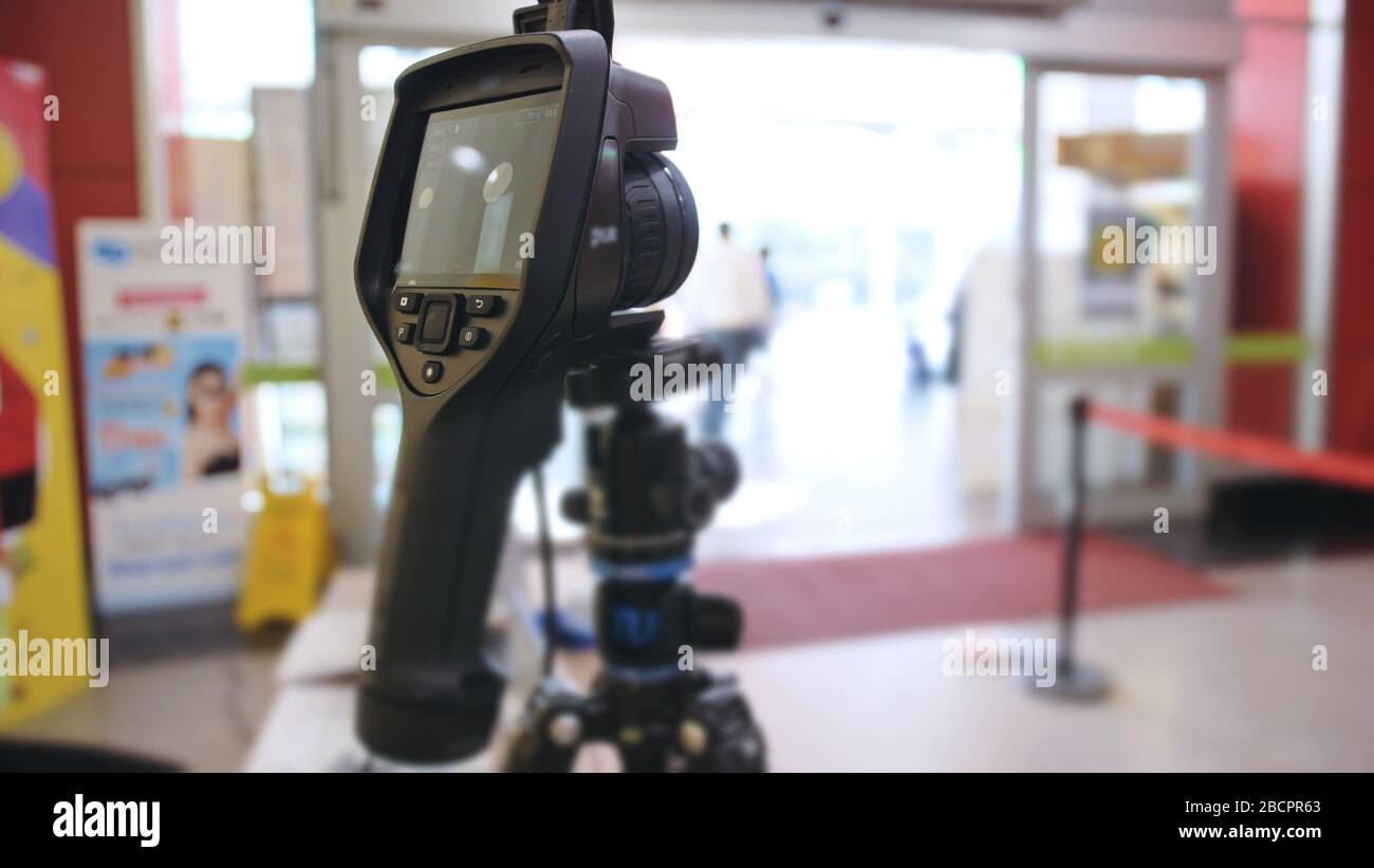 Temperature check at a supermarket, grocery store with a thermal ...