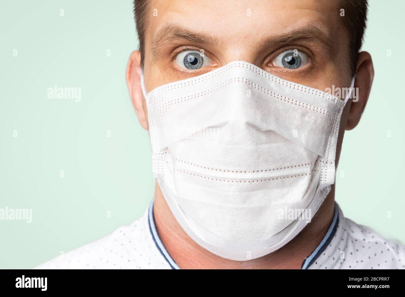 Young man wear masks to prevent air pollution, haze and PM 2.5 dust and ...