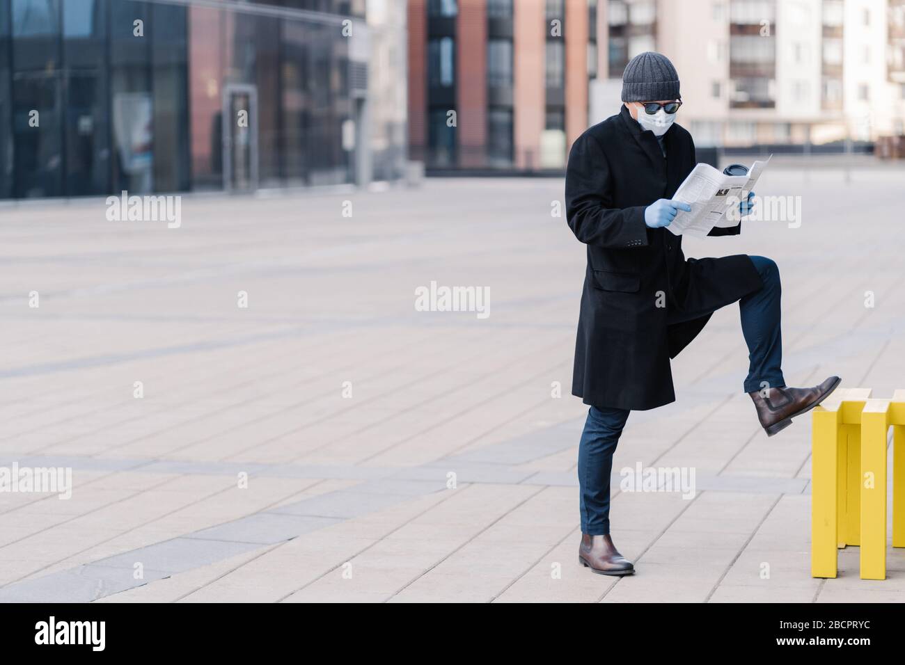 Sick man with flu wears medical mask to protect spreading infectious ...