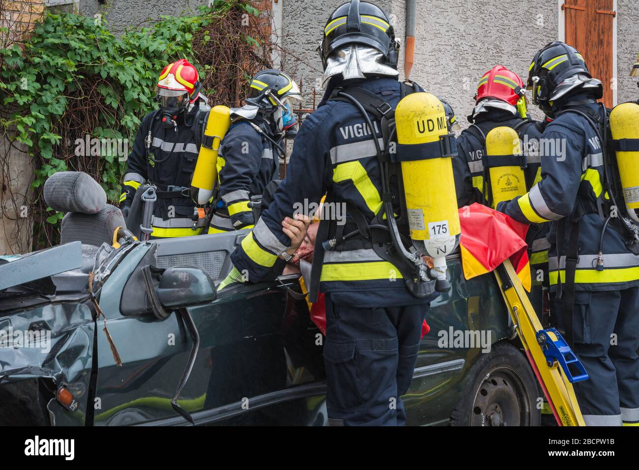 firefighters crewss rescue trapped driver during a road accident ...