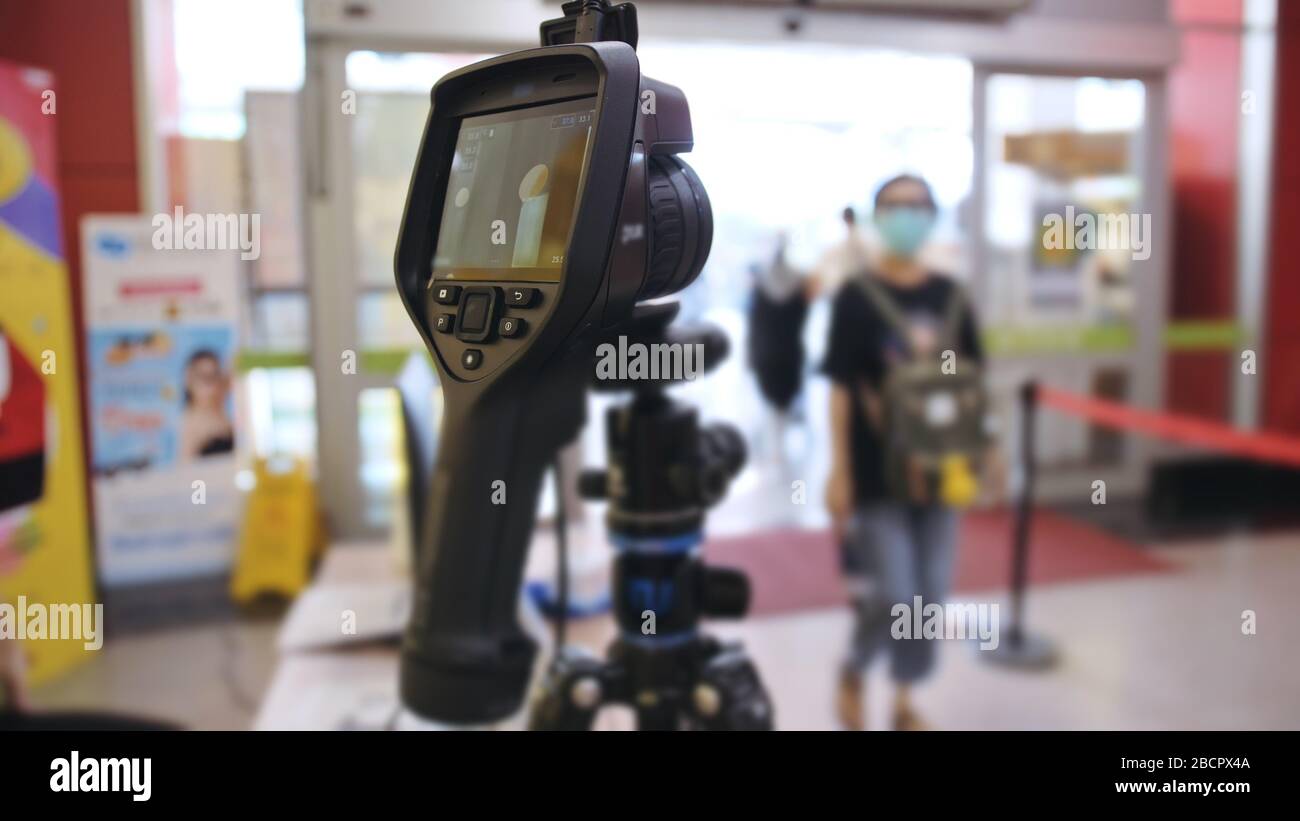 Temperature check at a supermarket, grocery store with a thermal ...