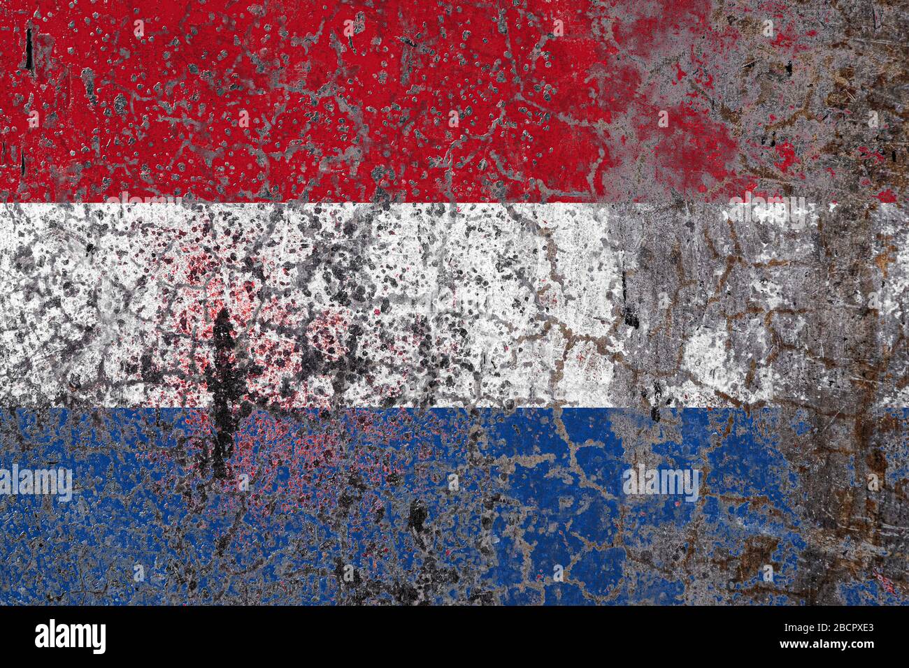 National flag of Netherlands on old peeling wall background.The concept ...