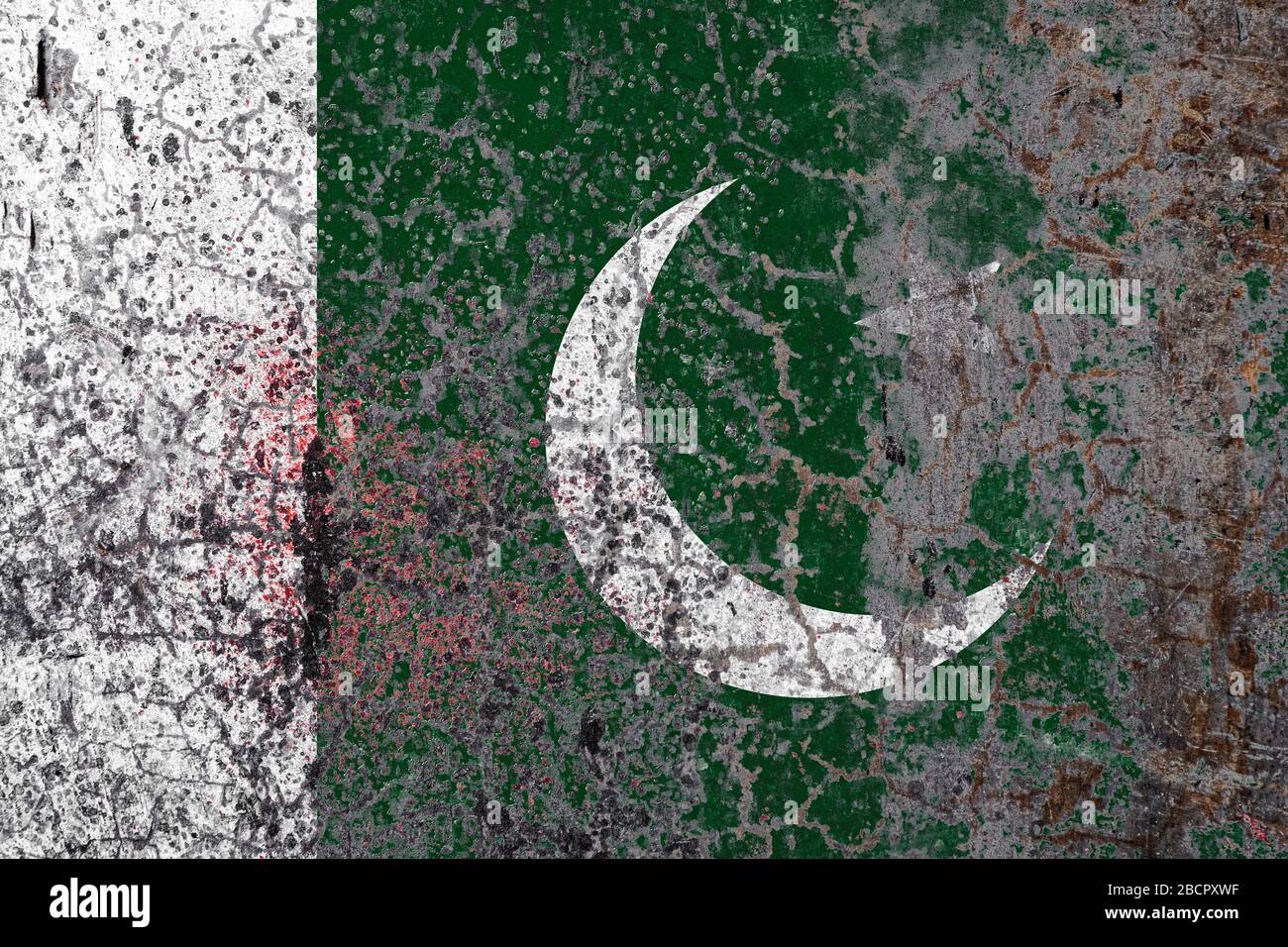 National flag of Pakistan on old peeling wall background.The concept of ...