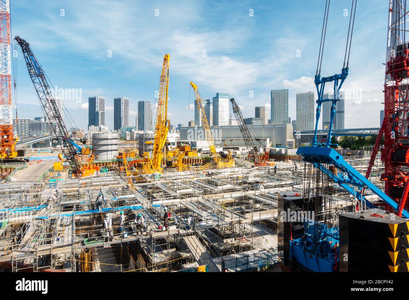 Big construction crane working in big construction site in Tokyo Japan ...