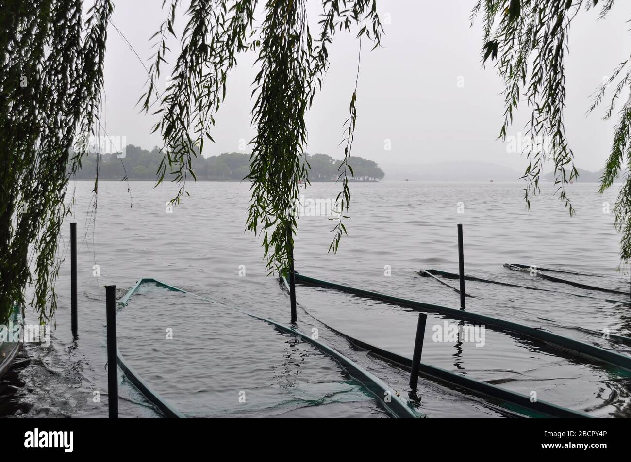 Sunken fishing boats in West Lake in Hangzhou. only the upper edge of ...