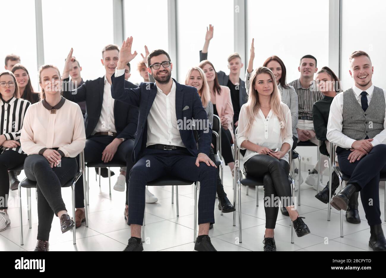 Asking questions during presentation hi-res stock photography and ...