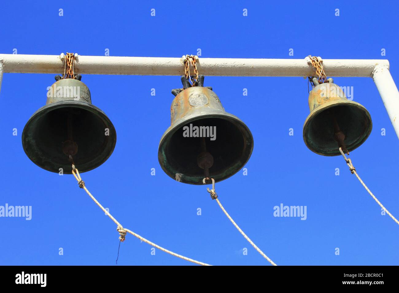 Bells outside of a Greek orthodox church Stock Photo - Alamy