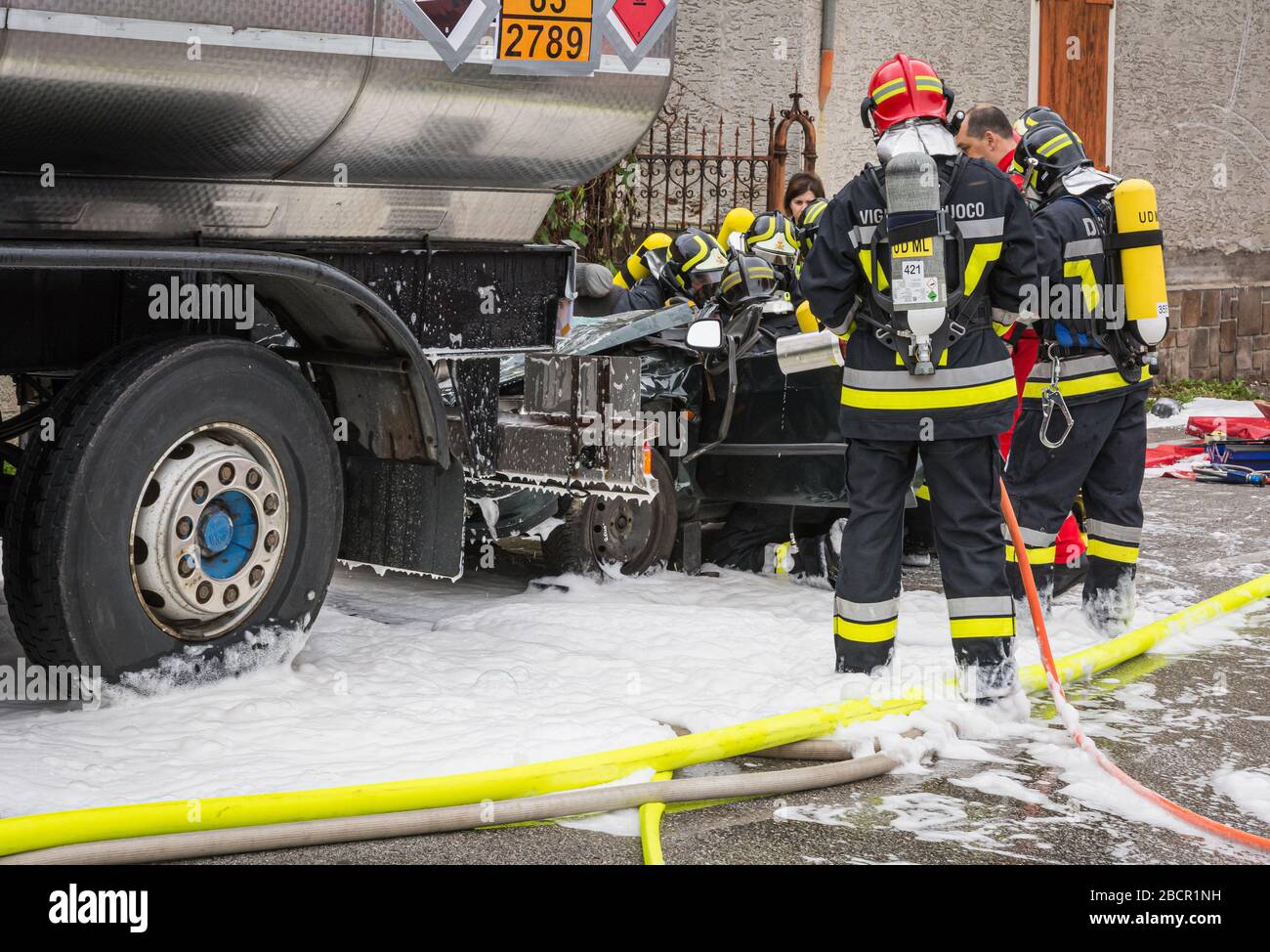 firefighters crewss rescue trapped driver during a road accident ...