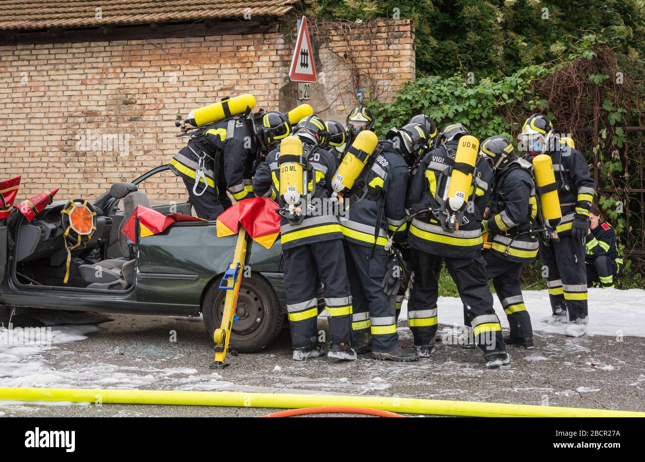 firefighters crewss rescue trapped driver during a road accident ...