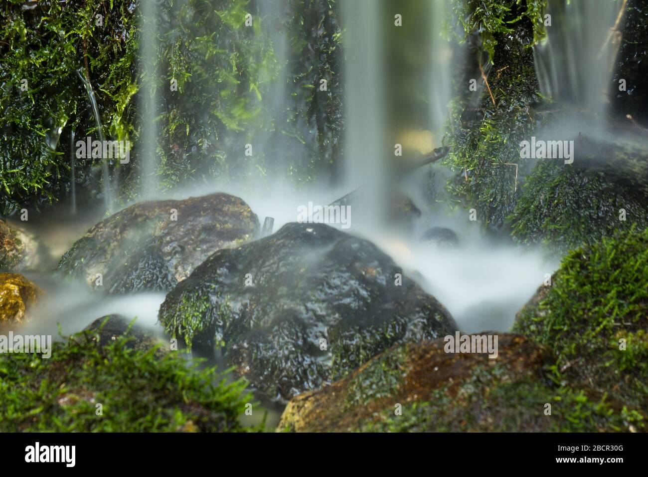 Dynamic small waterfall in the Austrian alps Stock Photo - Alamy