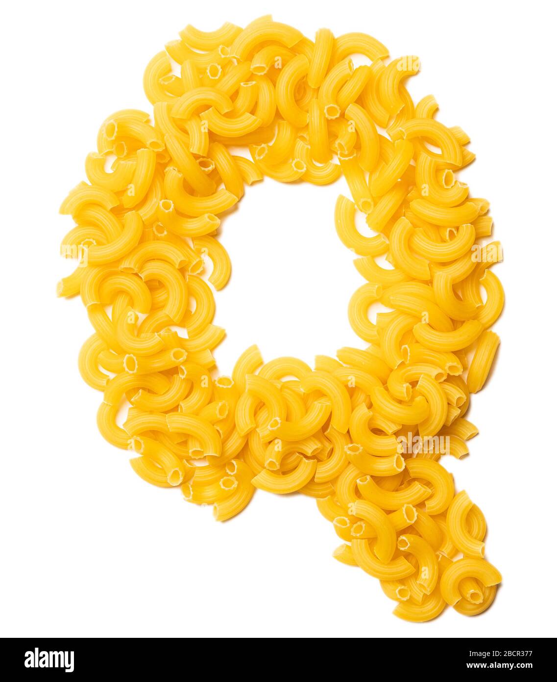 Letter Q of the English alphabet from dry pasta on a white isolated ...