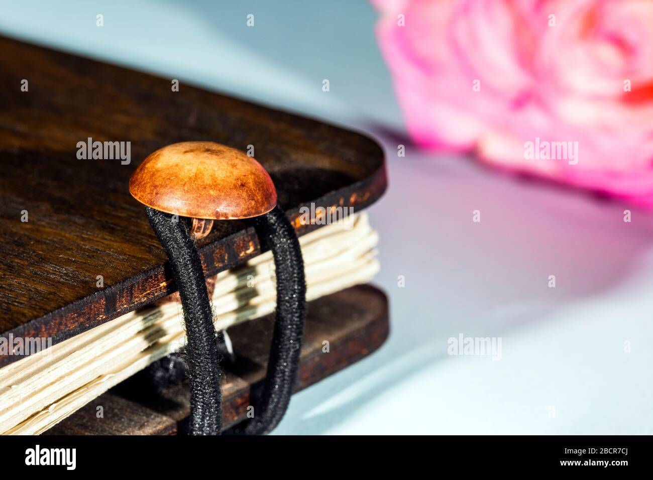 journaling concept background with blurred wood agenda on blue Stock ...