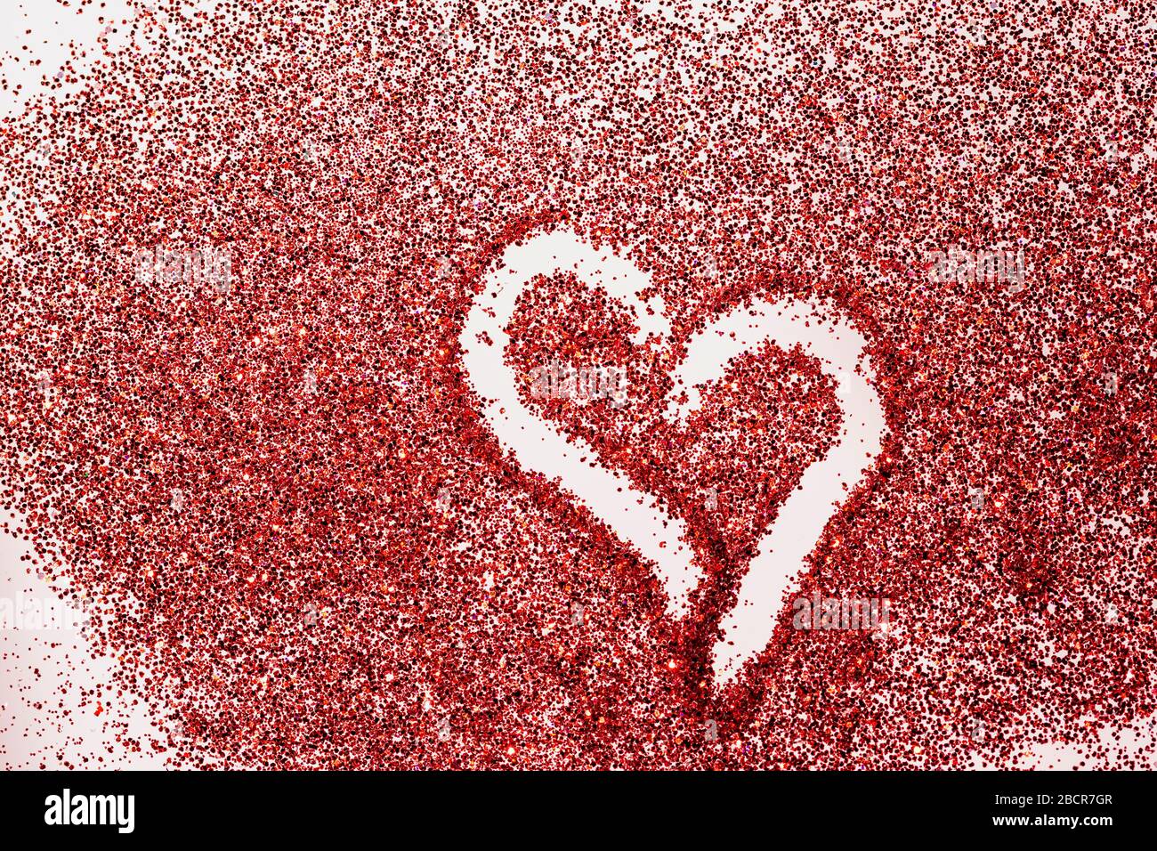 love concept background with heart on red glittery surface, valentines ...