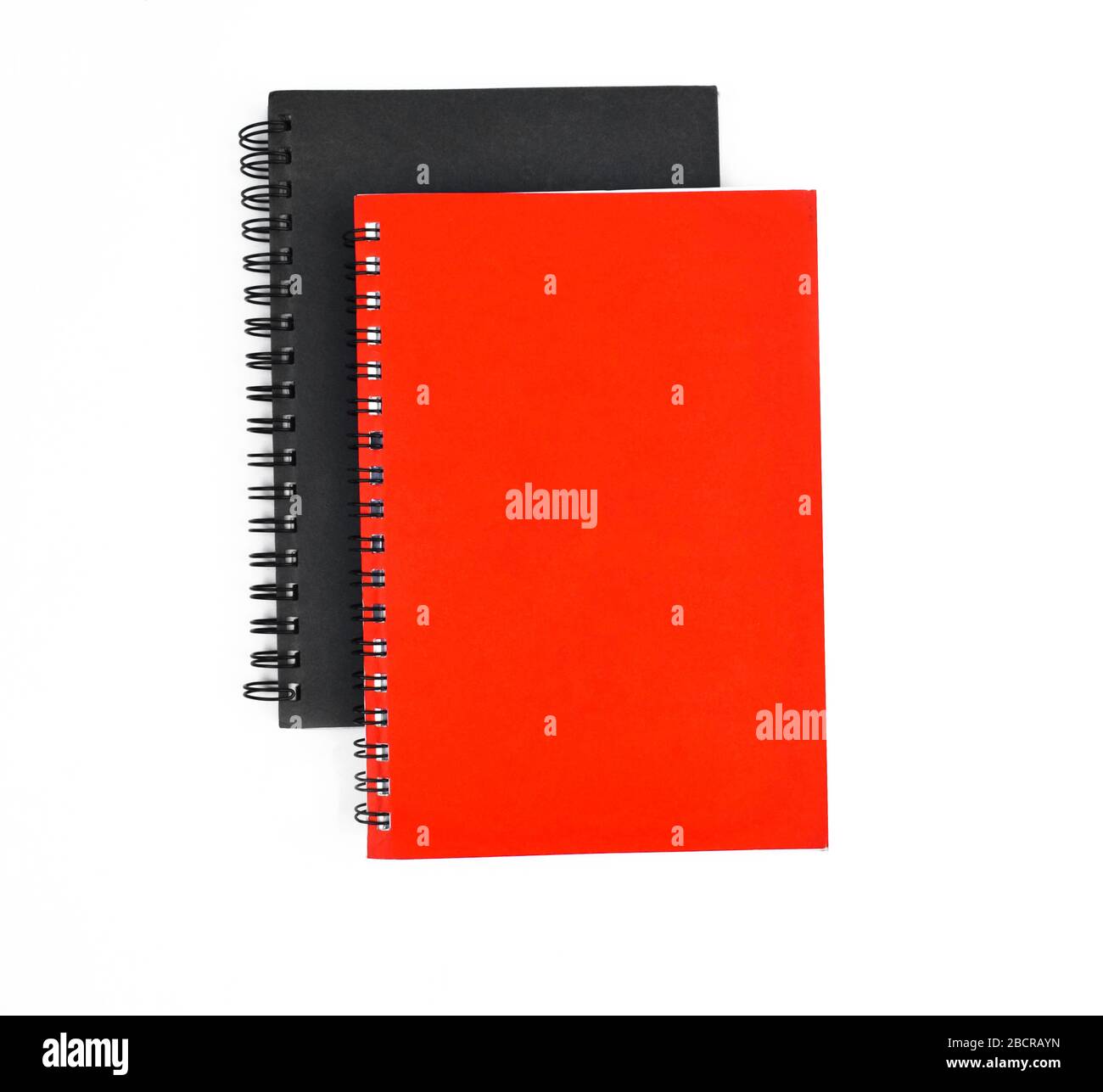 Photo of two paper note diary of red and black color placed on top of ...