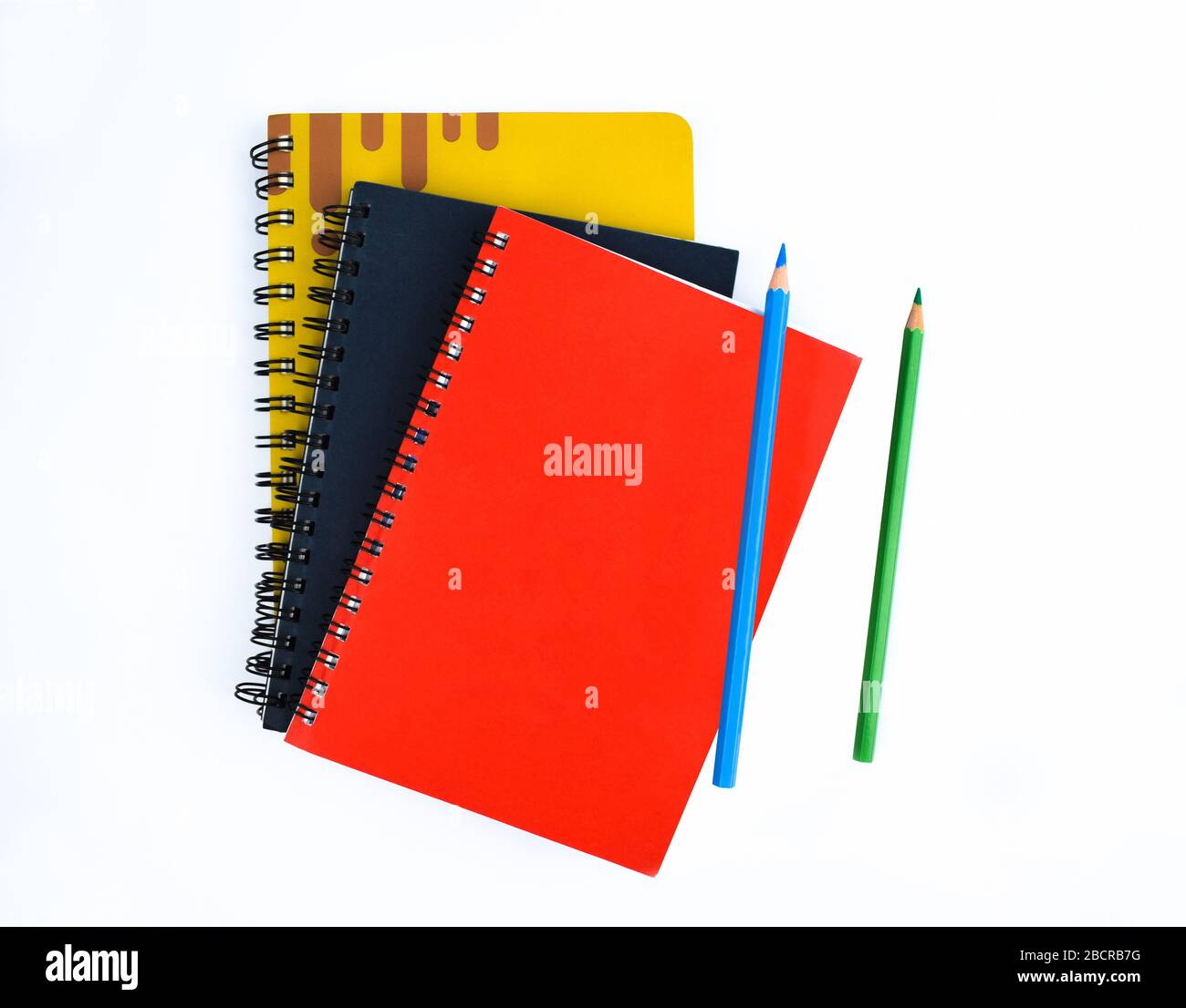 Two different colored wood pencil crayon placed with three different ...