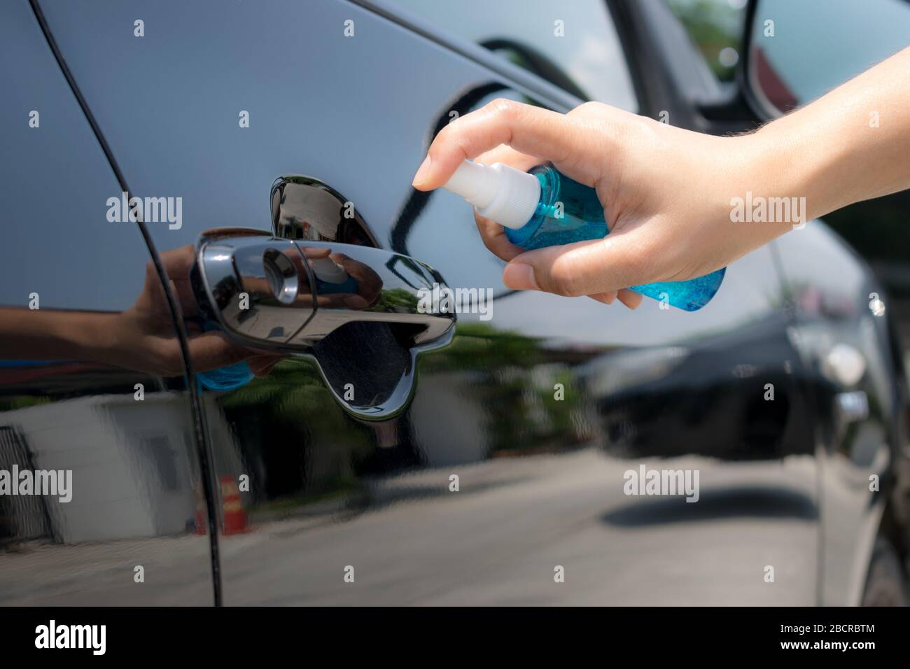 Spraying disinfectant alcohol door hi-res stock photography and images ...