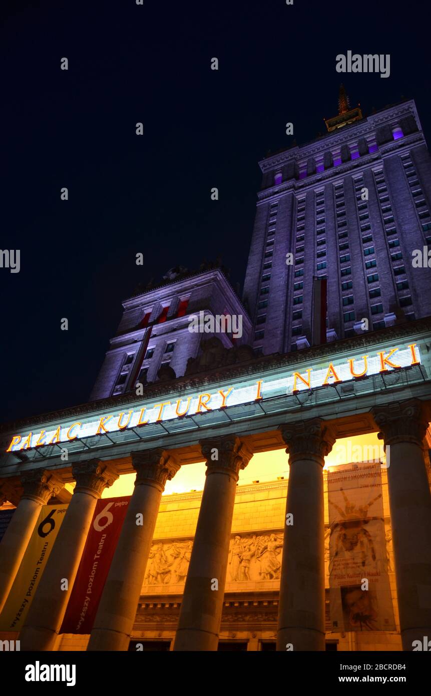 Entrance to the Palace of Culture and Science (PKiN) at night, built ...
