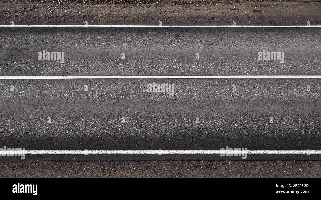 Asphalt highway grey texture with three white stripes Stock Photo - Alamy