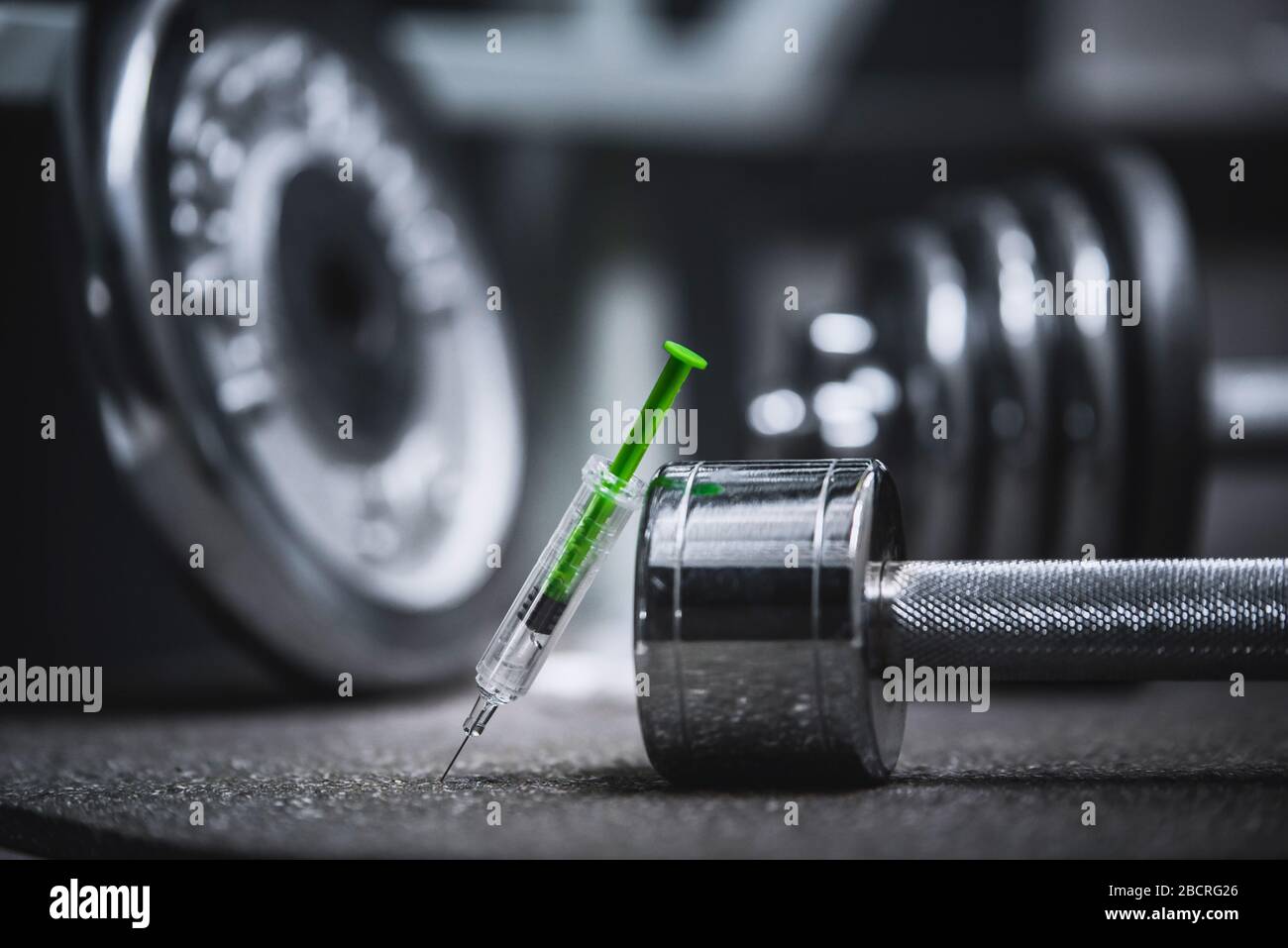 Syringe and stethoscope on a metal surface. Doping in gym Stock Photo ...