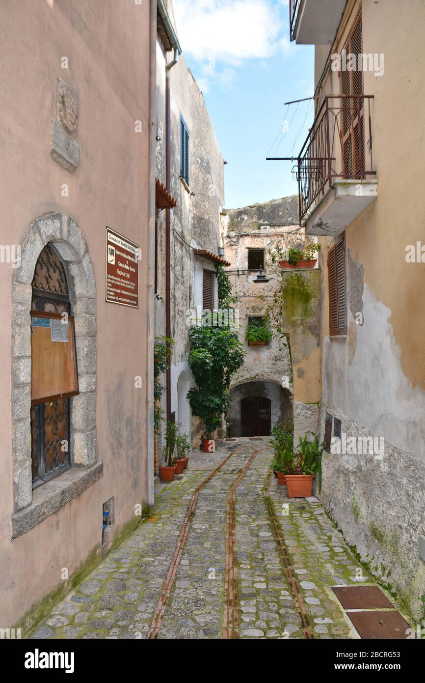 A narrow street in a small village in central Italy Stock Photo - Alamy