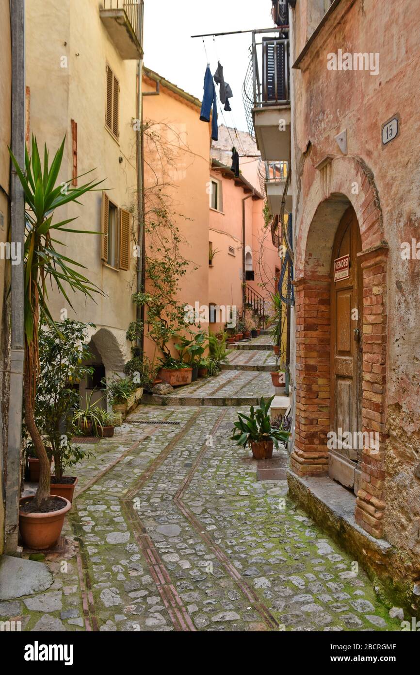 A narrow street in a small village in central Italy Stock Photo - Alamy