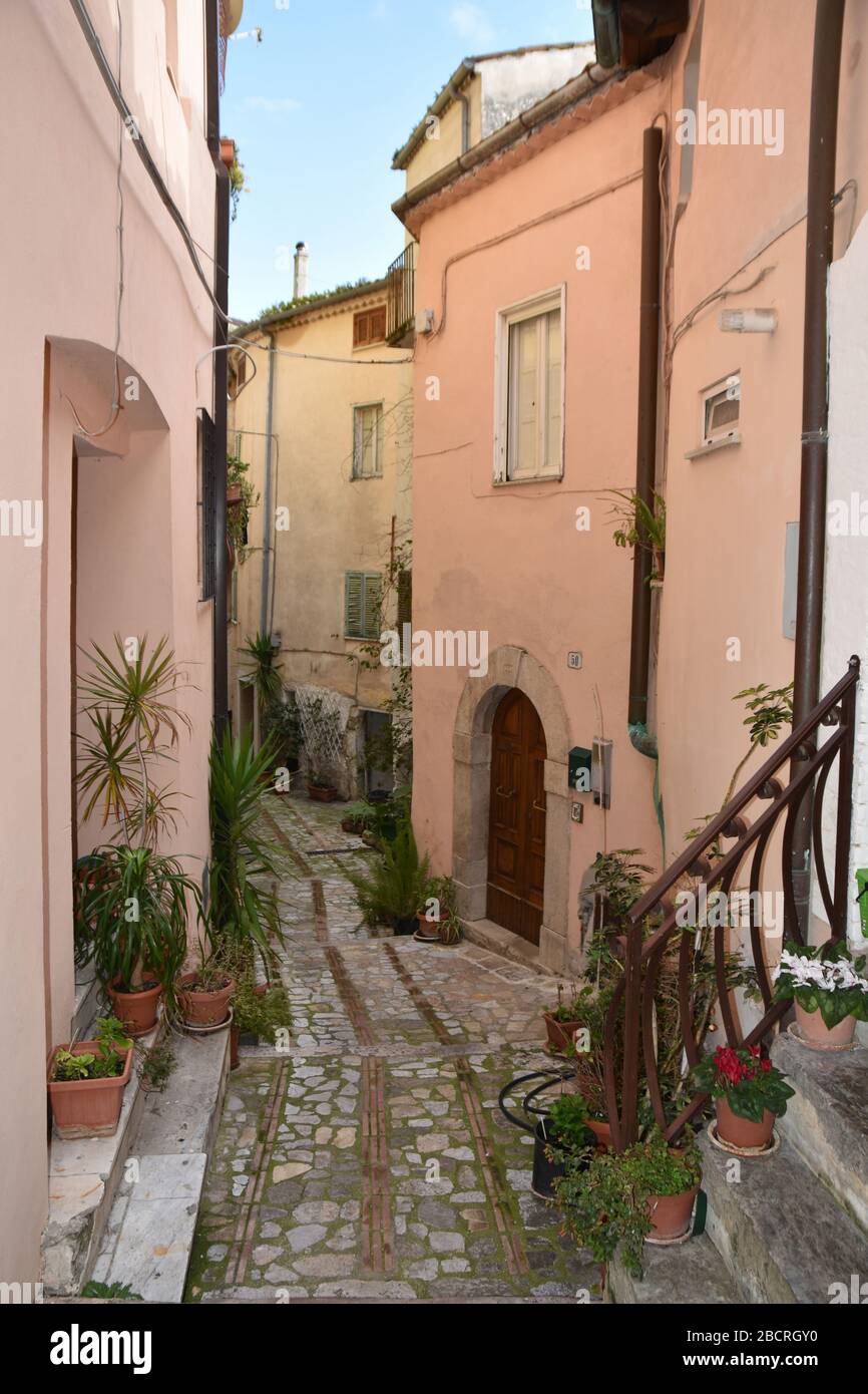 A narrow street in a small village in central Italy Stock Photo - Alamy