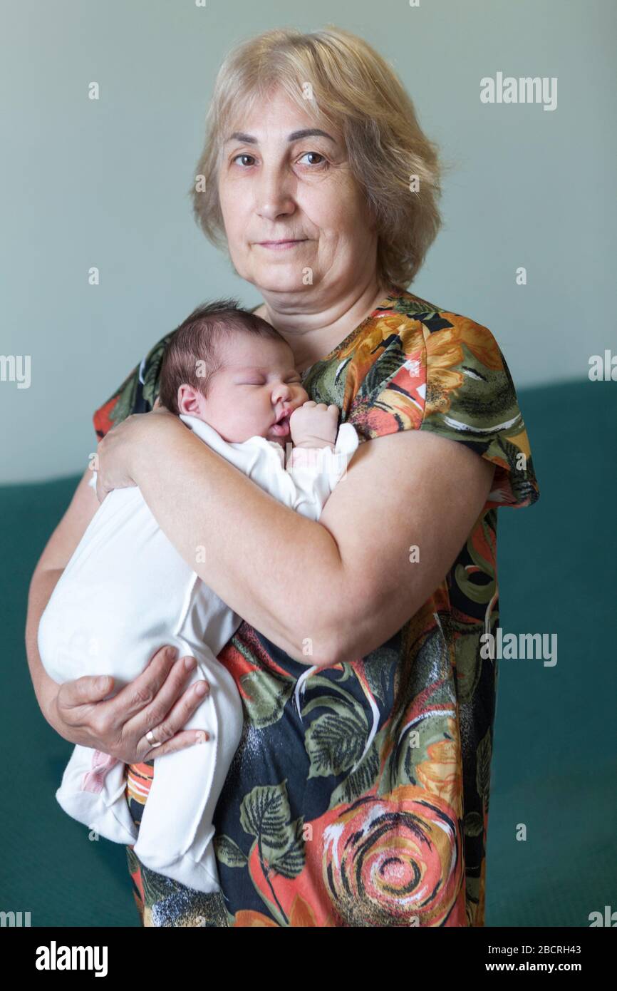 Son hugging elderly mother hi-res stock photography and images - Alamy