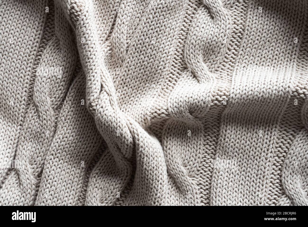 Texture gray knitted fabric with a pattern Stock Photo - Alamy