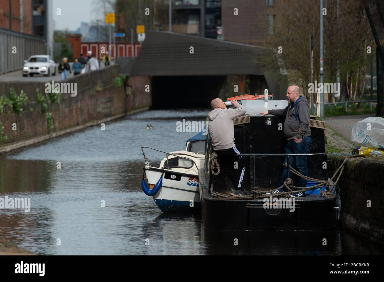 Two men on barge hi-res stock photography and images - Alamy