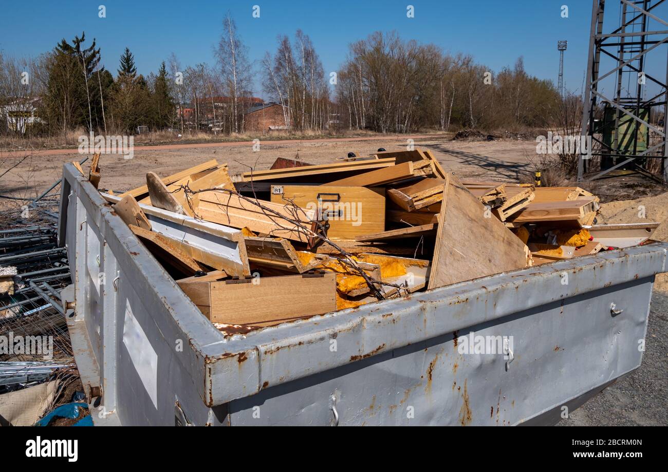 Container with wood recycling rubble Stock Photo - Alamy