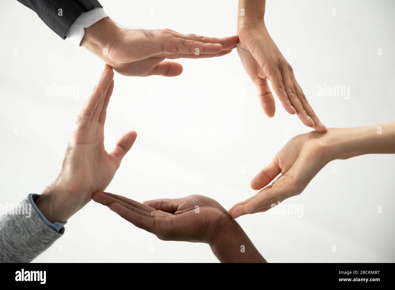 Concept of diverse business people join hands forming circle Stock ...