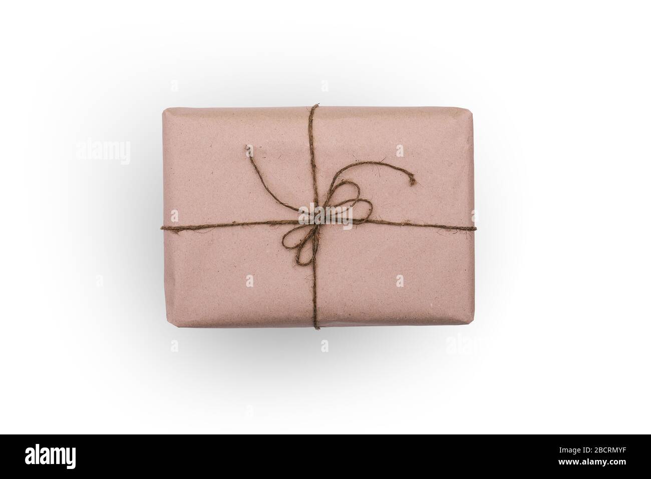 The box is wrapped in brown paper and tied with thread. Rectangular ...