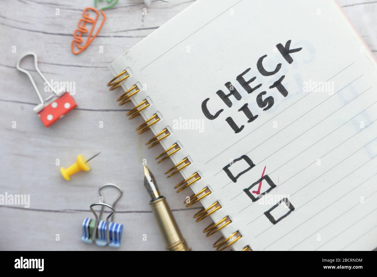 Check list on notepad hi-res stock photography and images - Alamy