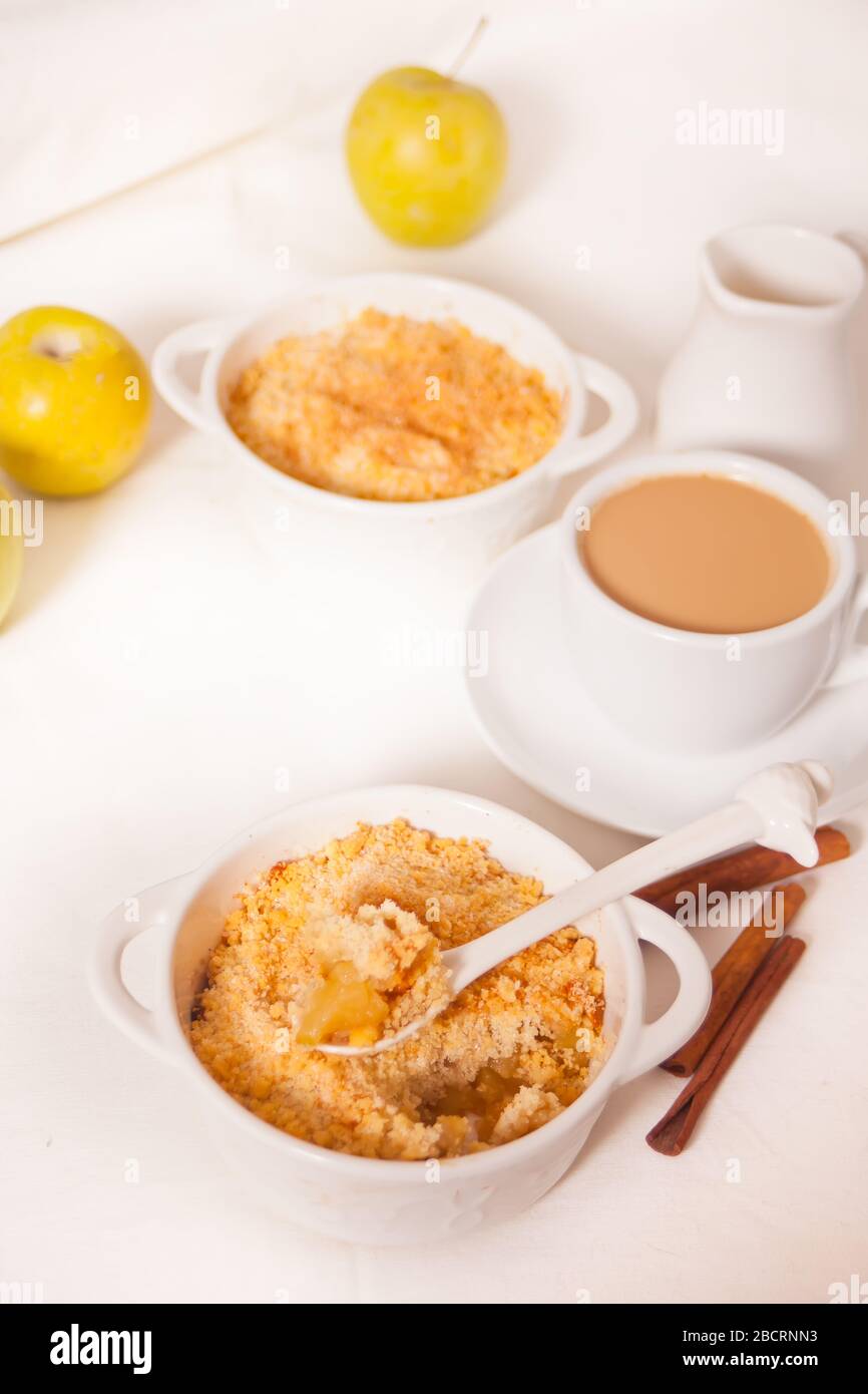 Tasty homemade apple crumble dessert on the white background Stock ...