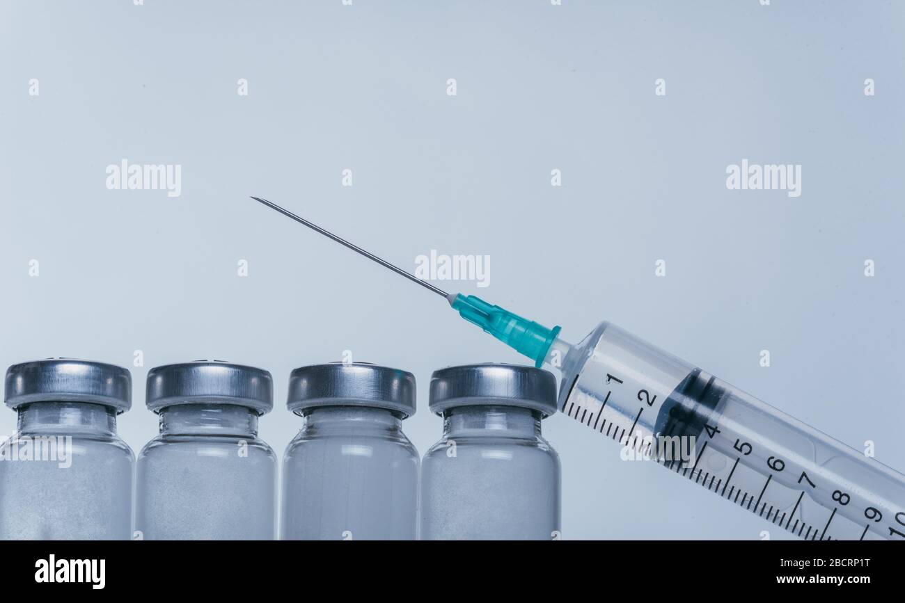 Medicine, Injection, vaccine and disposable syringe, drug concept ...