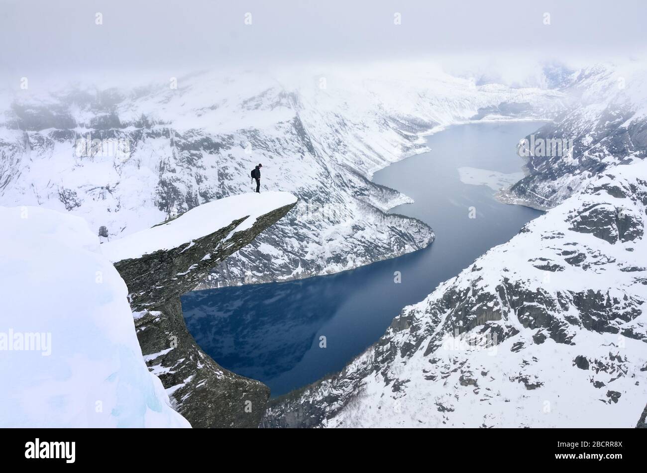 Troll tongue rock in Norway with wonderful winter view after long ...
