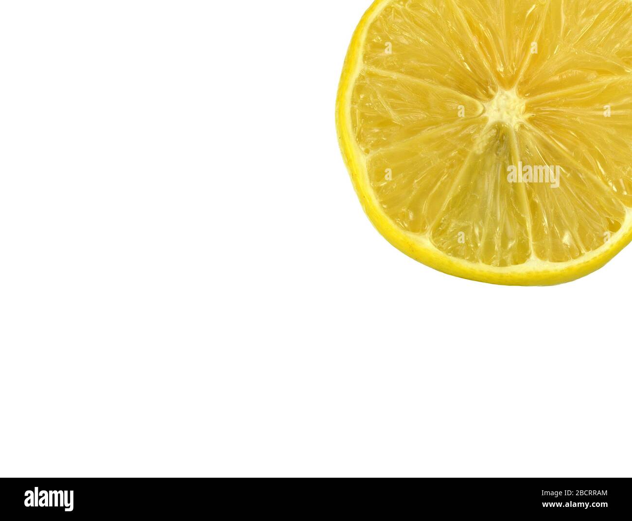 Juicy yellow slice of lemon on a white background isolated. Cut lemon ...