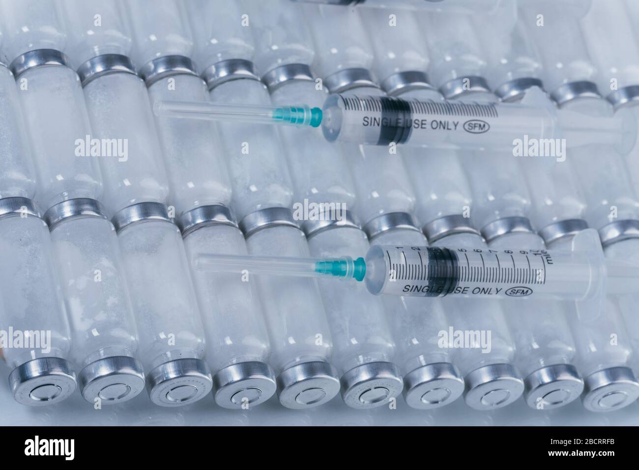 Medicine, Injection, vaccine and disposable syringe, drug concept ...