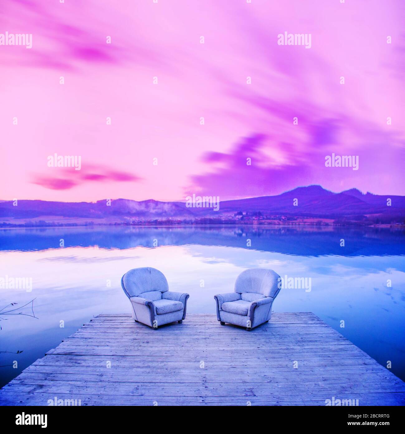 Chairs by lake, sunset light in background. Thinking, dialogue ...